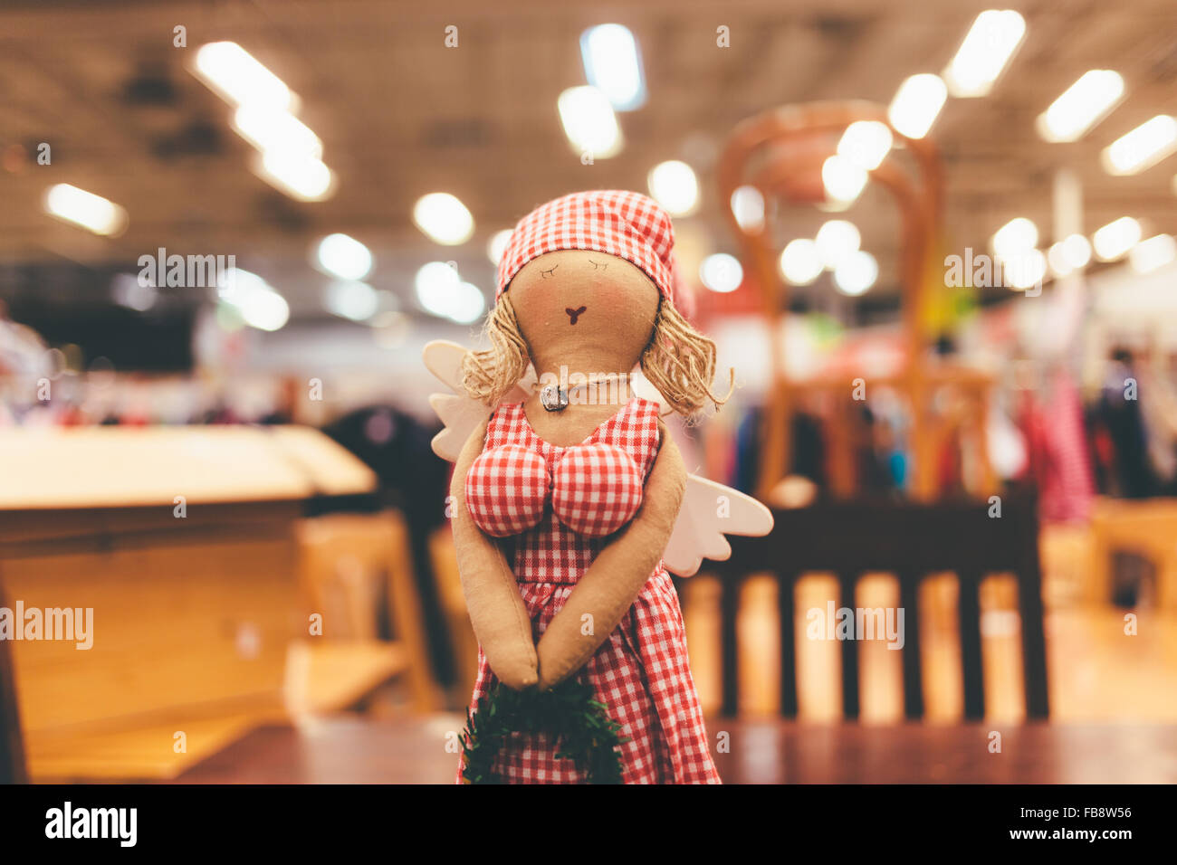Doll in it is red a white dress made hands of fabric Stock Photo - Alamy