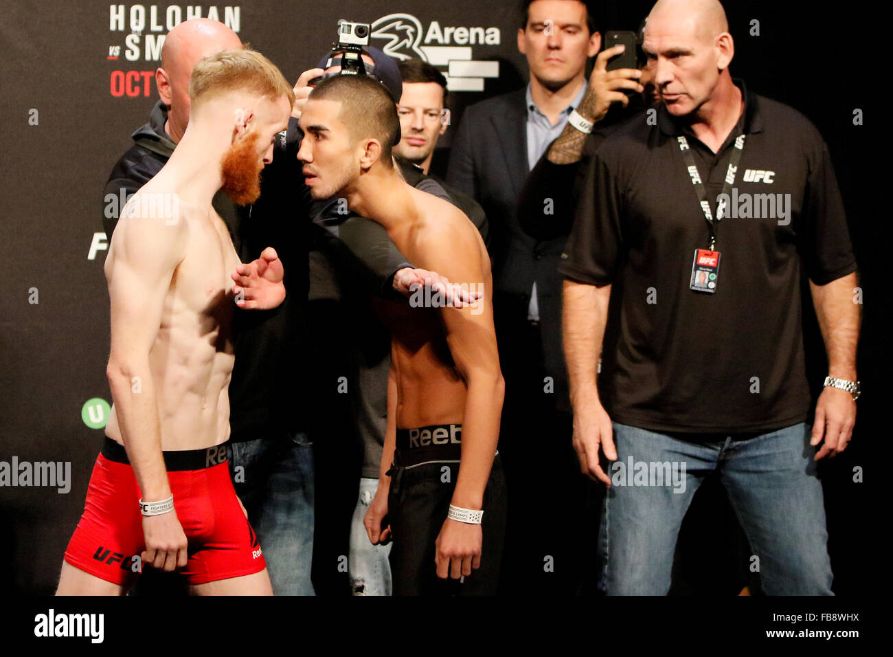 Paddy Holohan and Louis Smolka face of during the Weigh In UFC Fight ...
