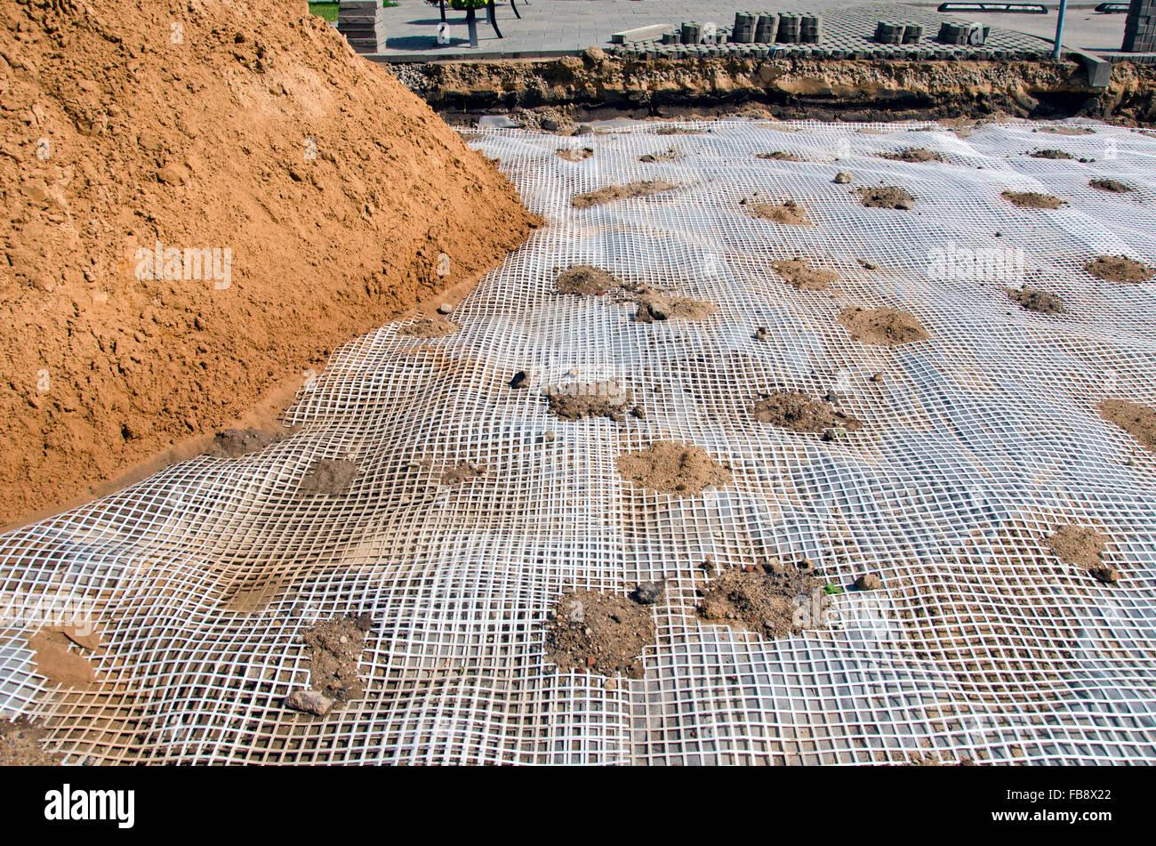 Preparation for laying pavement street asphalt with plastic net in ...