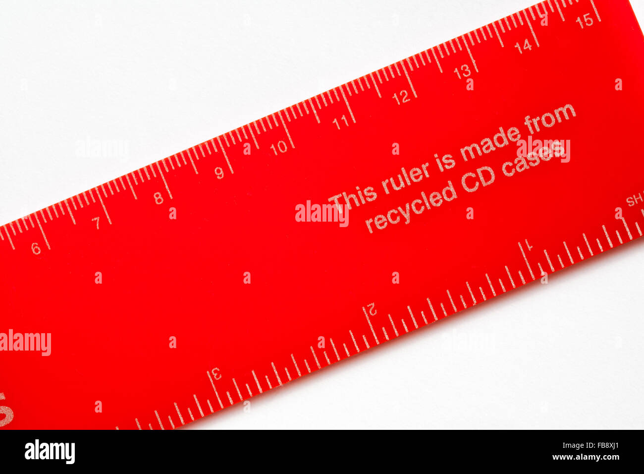 This ruler is made from recycled CD cases - ruler set on white ...