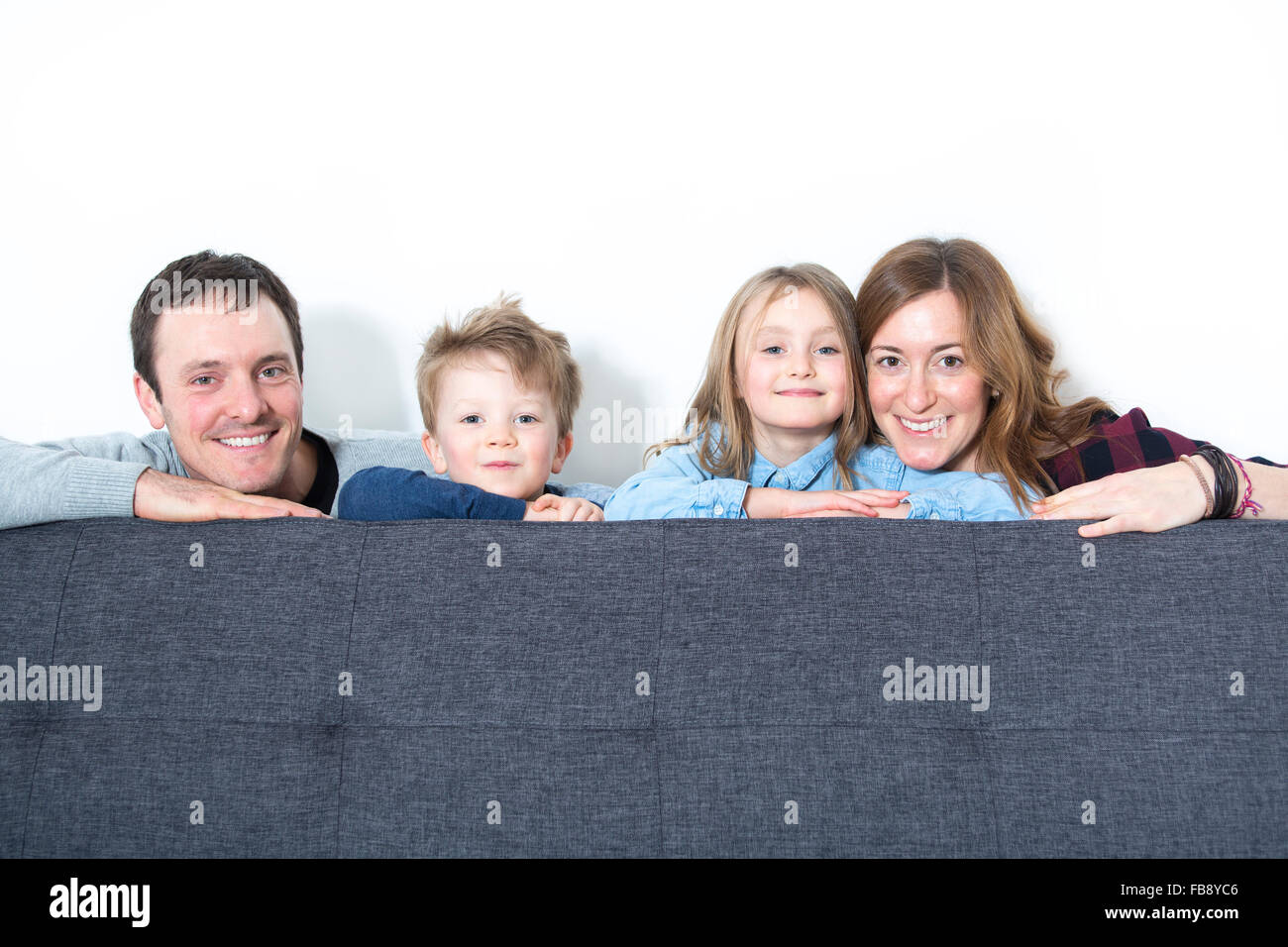 Family mother father child sit hi-res stock photography and images - Alamy