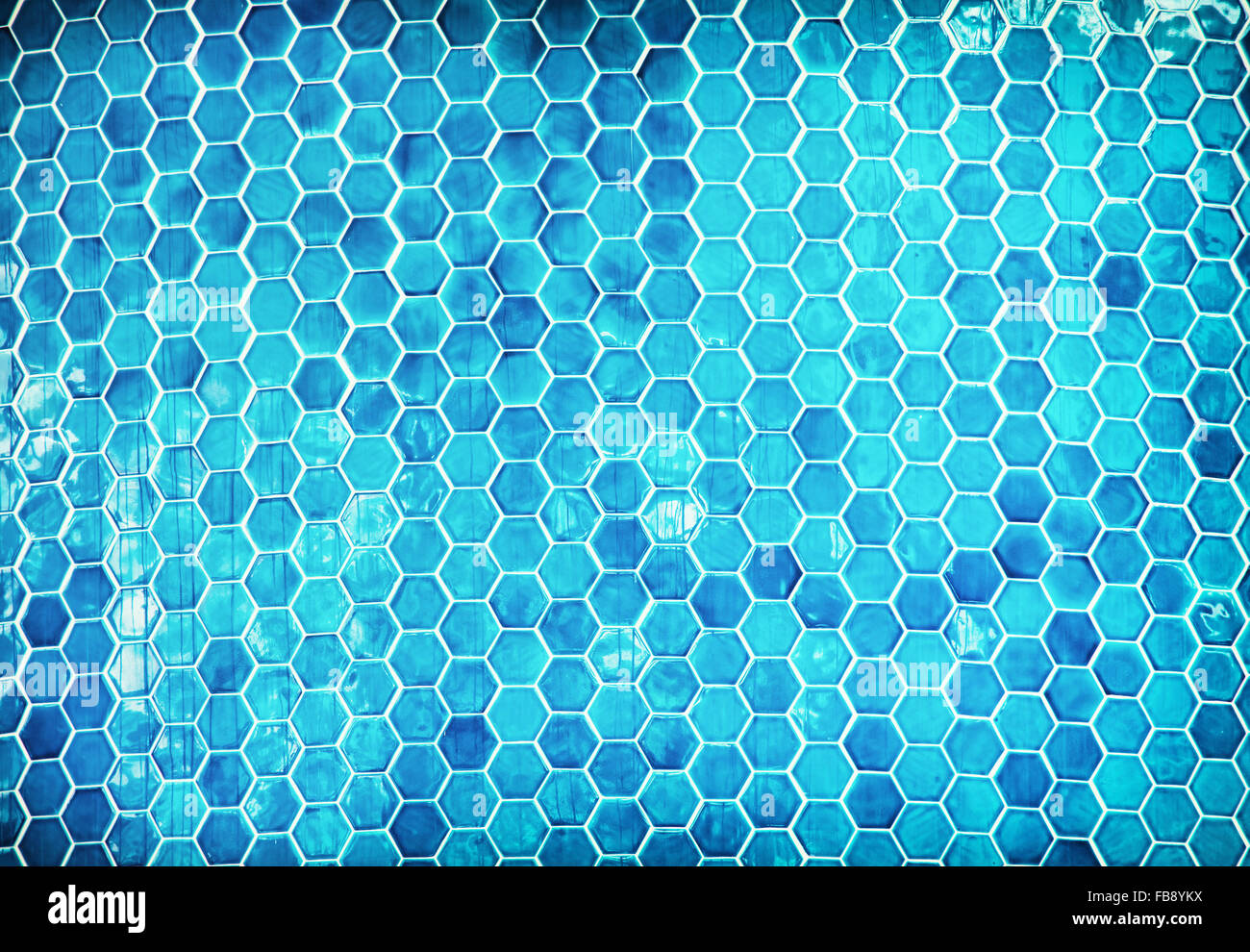 Blue hexagon mosaic swimming pool. Summer vacation Stock Photo - Alamy