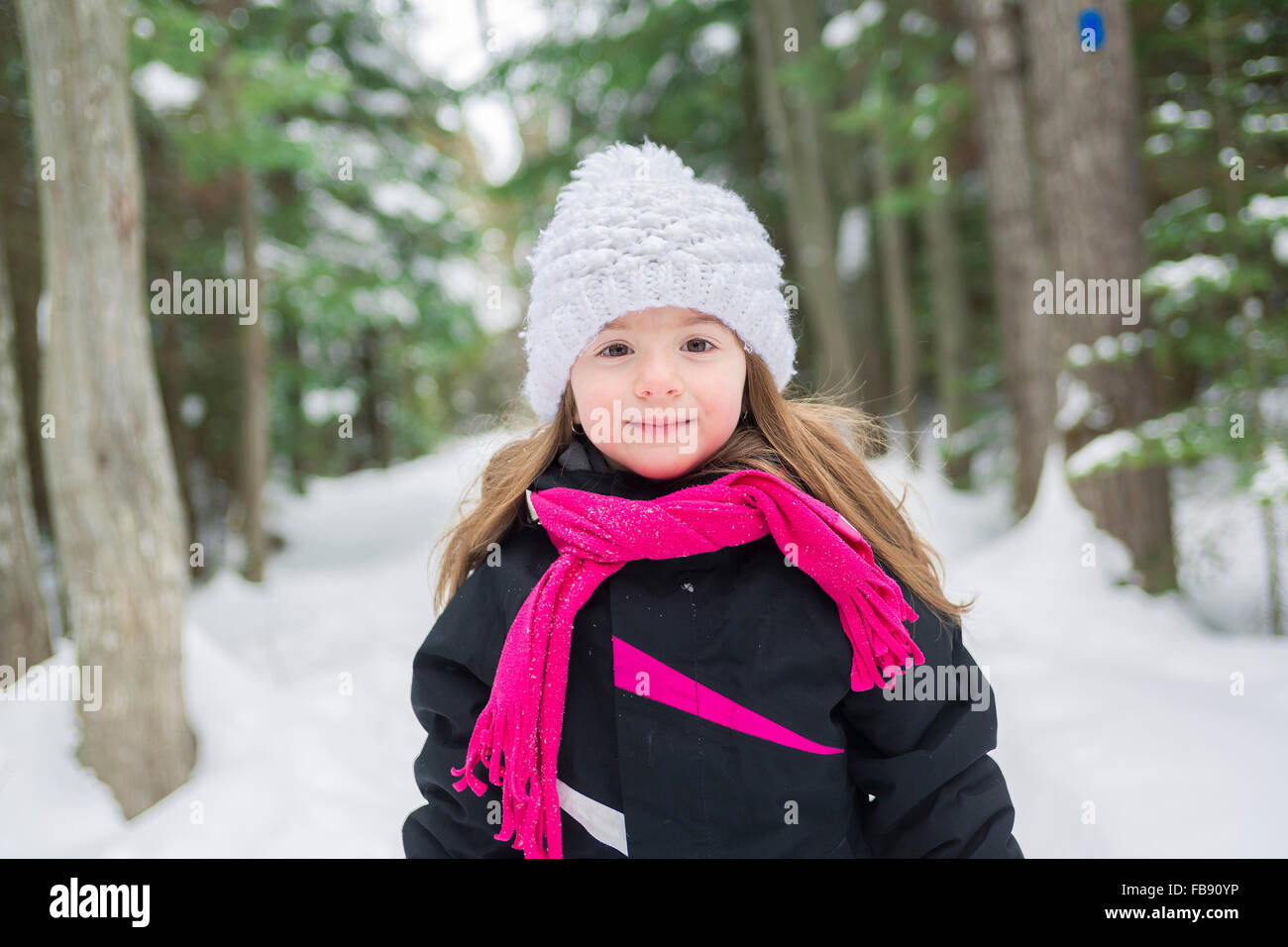 Girl in winter clothes. Happy child outside photo Stock Photo - Alamy