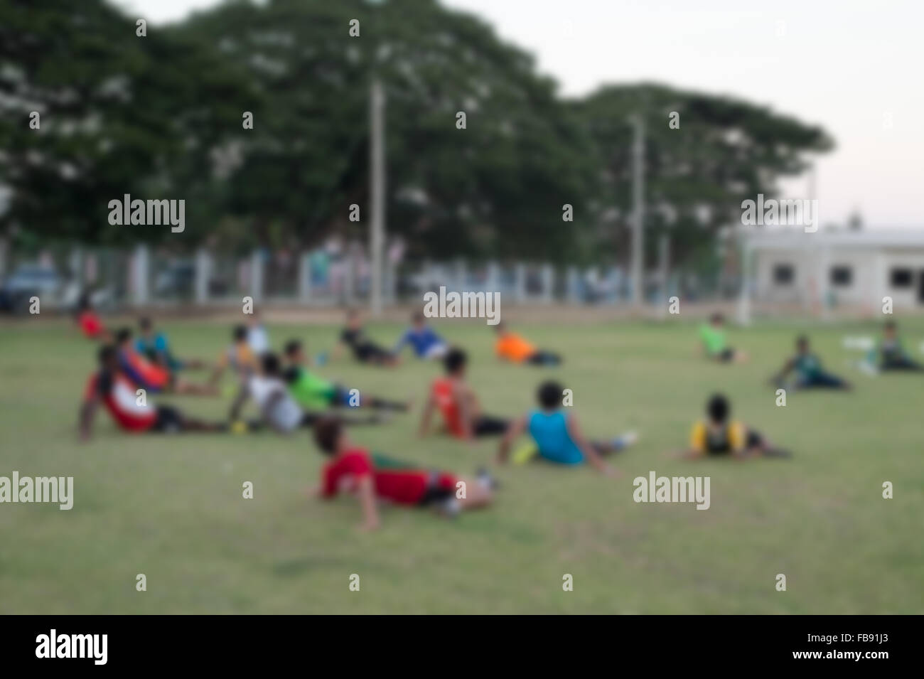 blurry,motion blur,Players in action playing football,Stretching ...