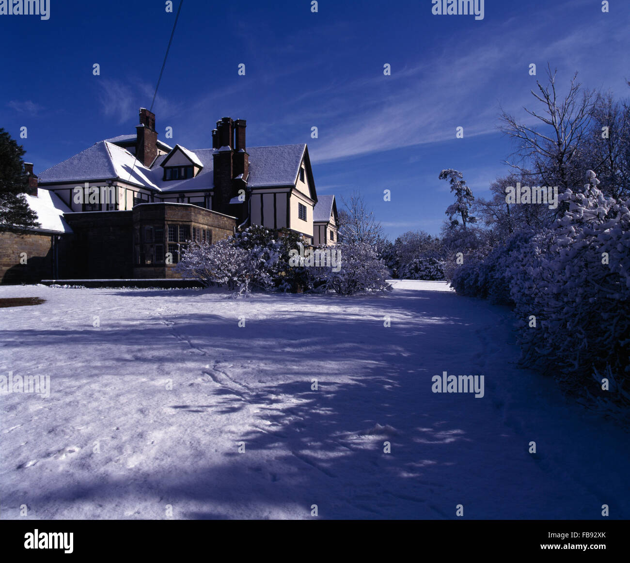 Exterior of a traditional country house in the snow Stock Photo - Alamy