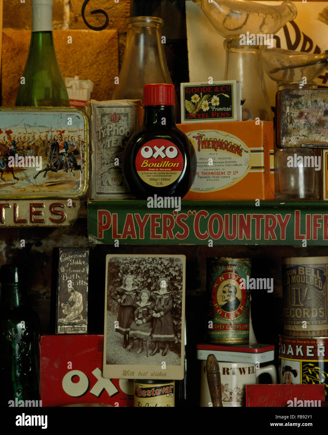 Collection of vintage tins and jars on kitchen shelves Stock Photo - Alamy