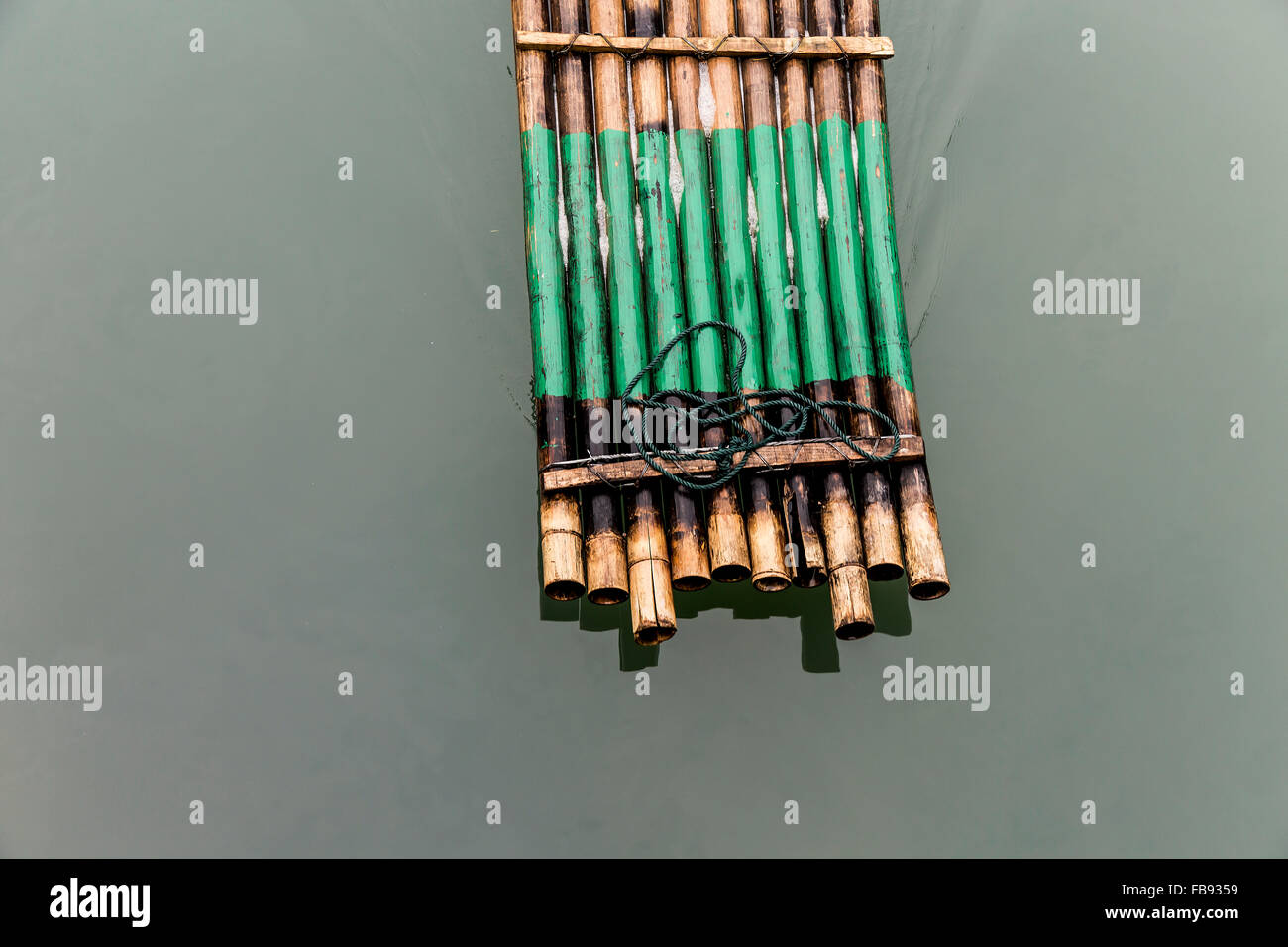 Bamboo raft floating on the Yulong River, China Stock Photo - Alamy