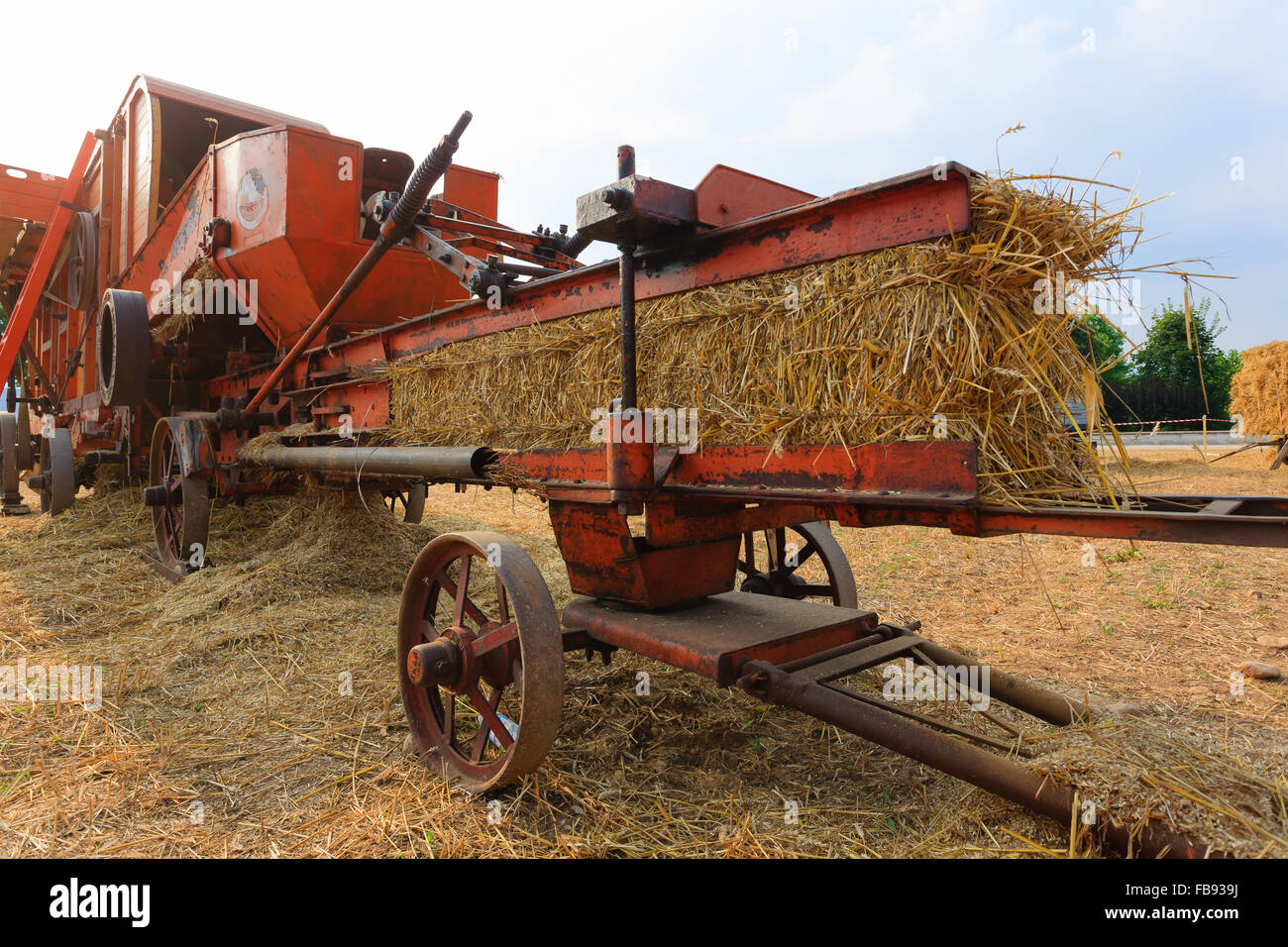 Agriculture old grain thresher agricultural hi-res stock photography ...