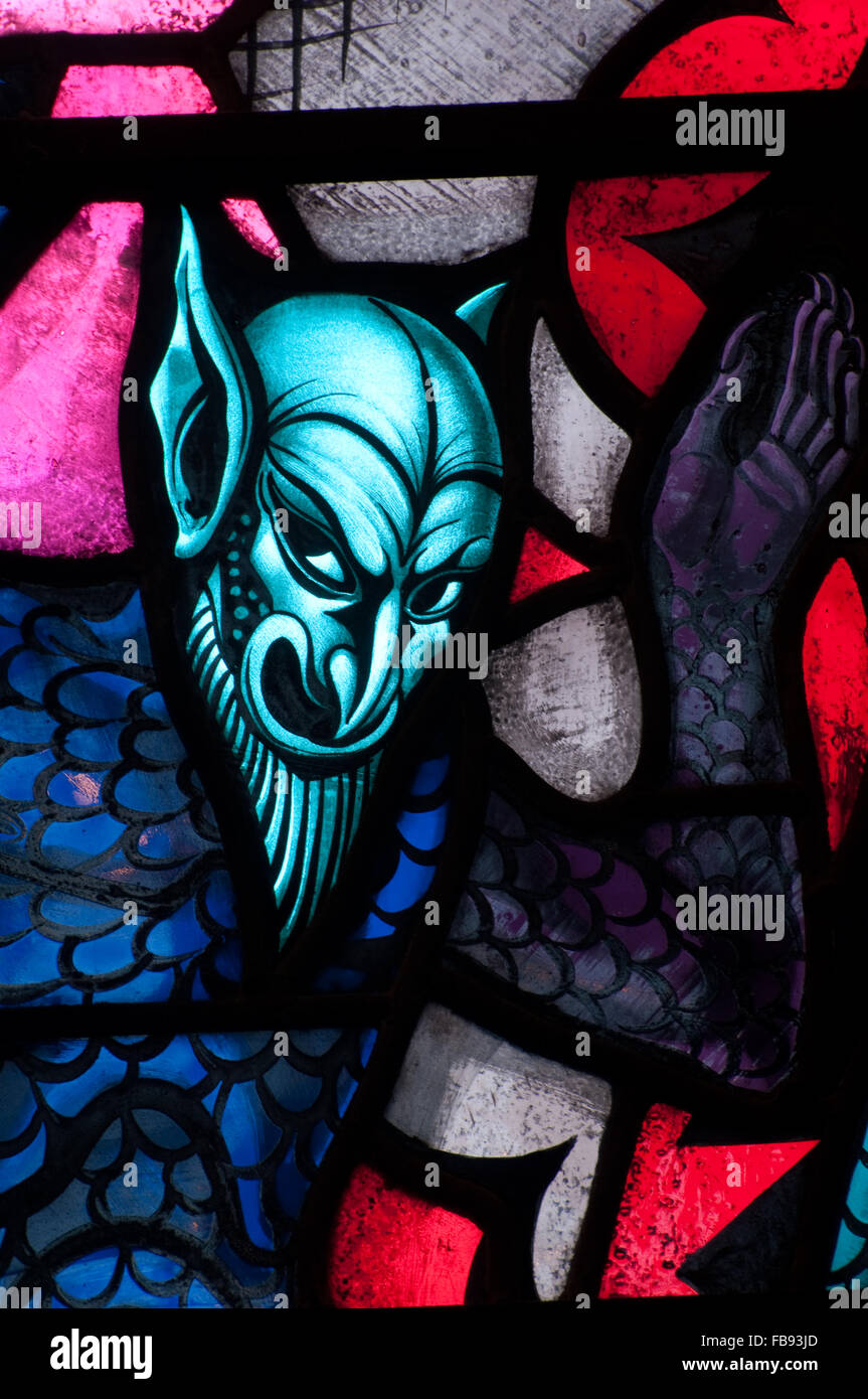 Devil depicted in stained glass window Stock Photo - Alamy