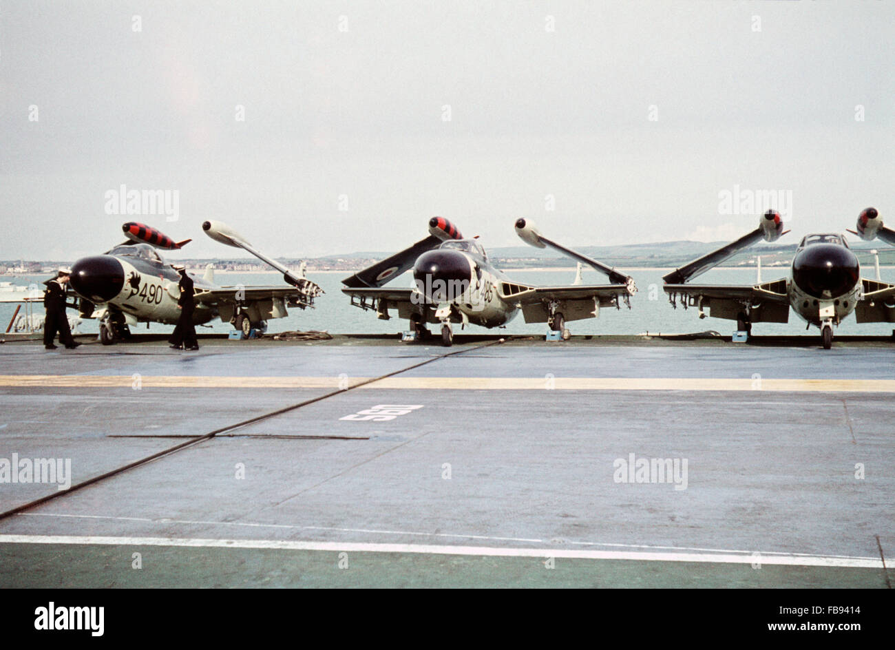 HMS Eagle with Sea Venoms on deck in Weymouth Bay 1959 Stock Photo - Alamy