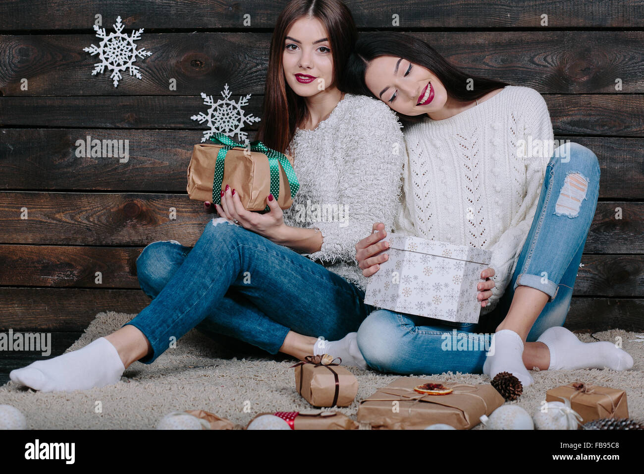 portrait of two beautiful girls at Christmas Stock Photo - Alamy