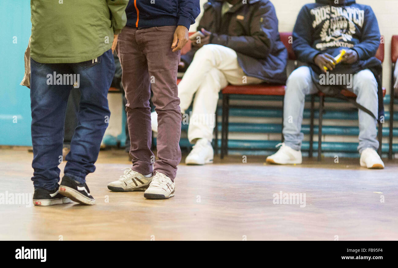 unidentifiable young men at a UK community centre Stock Photo - Alamy