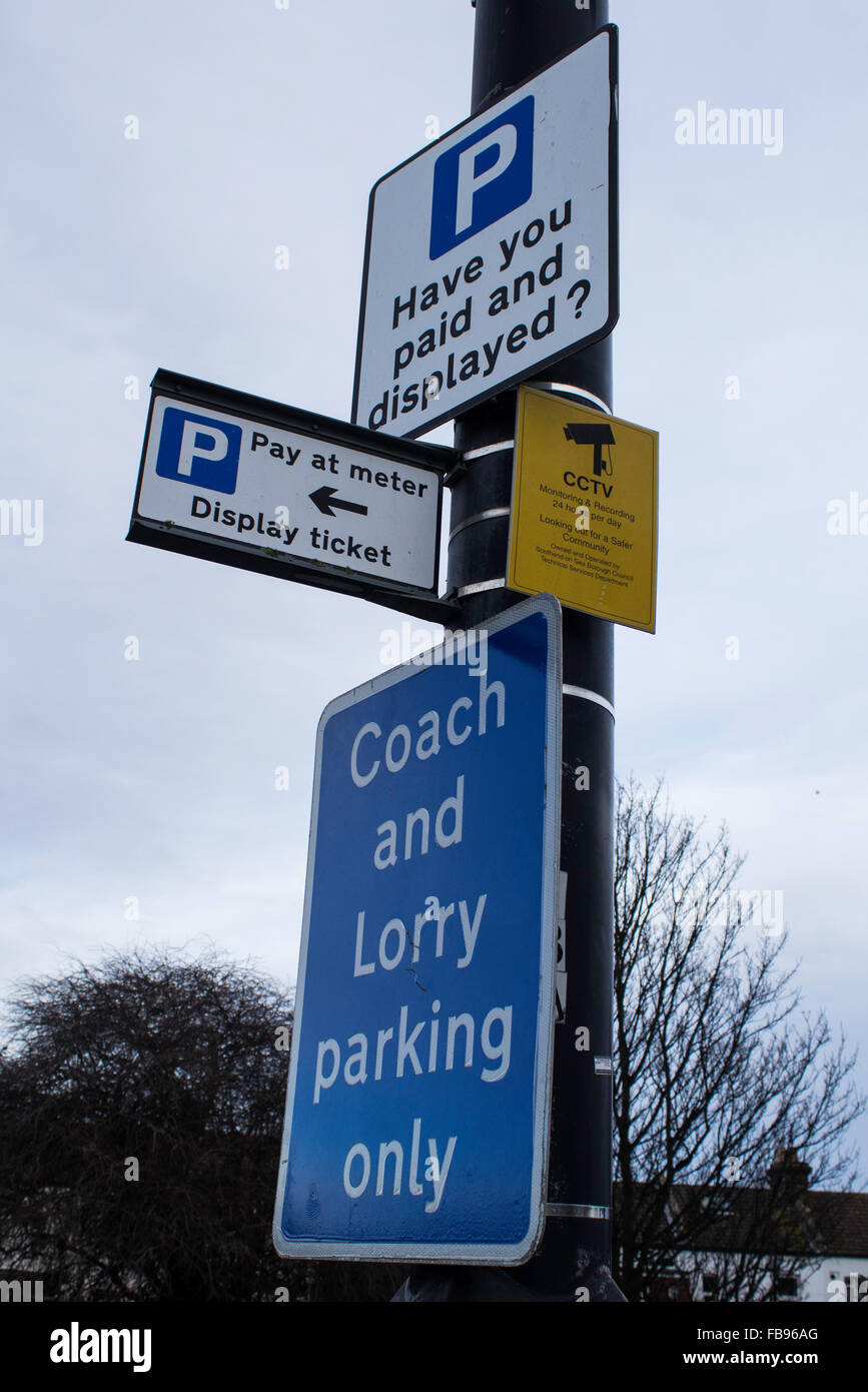 Car parking signs on lamp post Stock Photo - Alamy