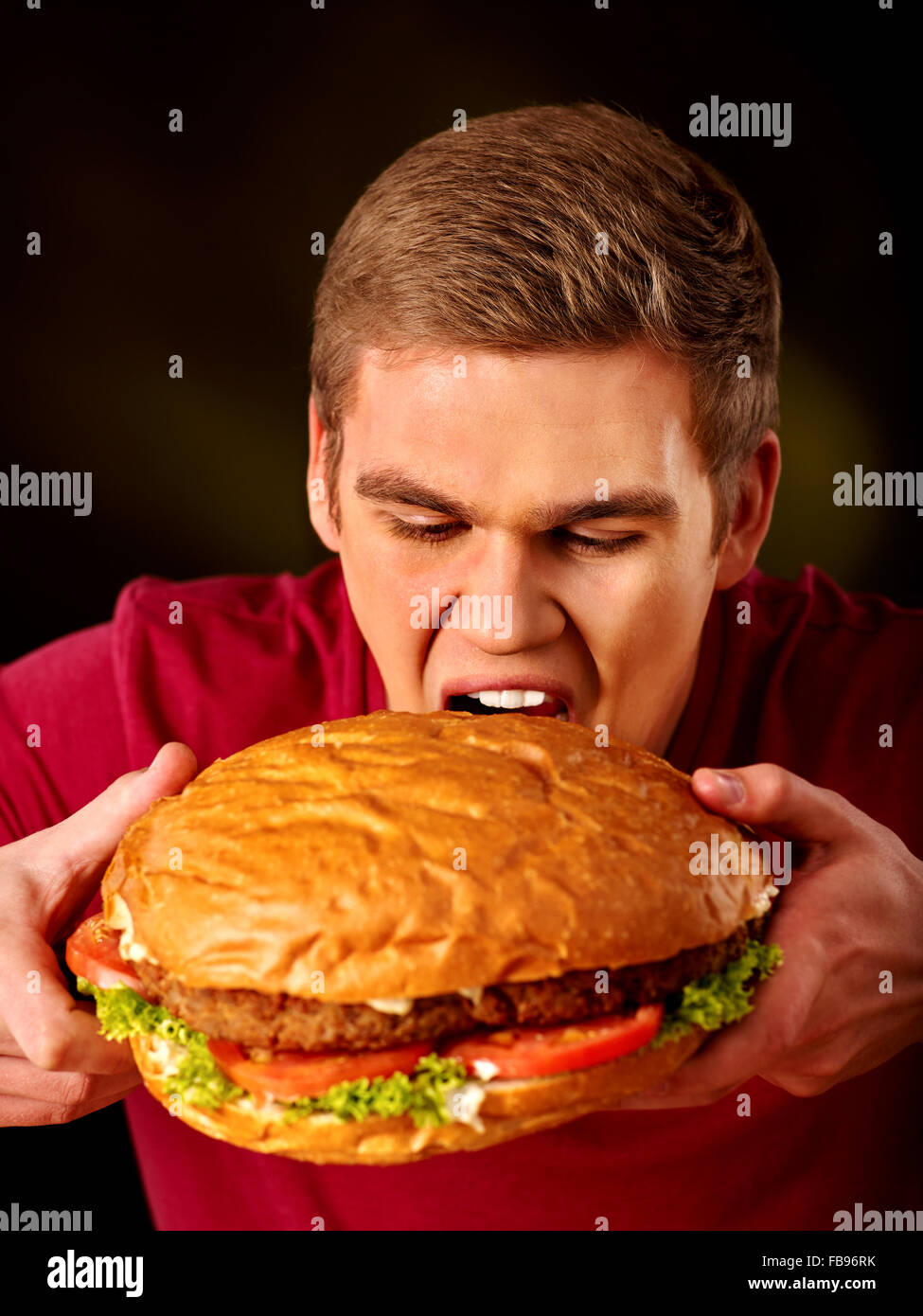 Man eating big sandwich Stock Photo - Alamy