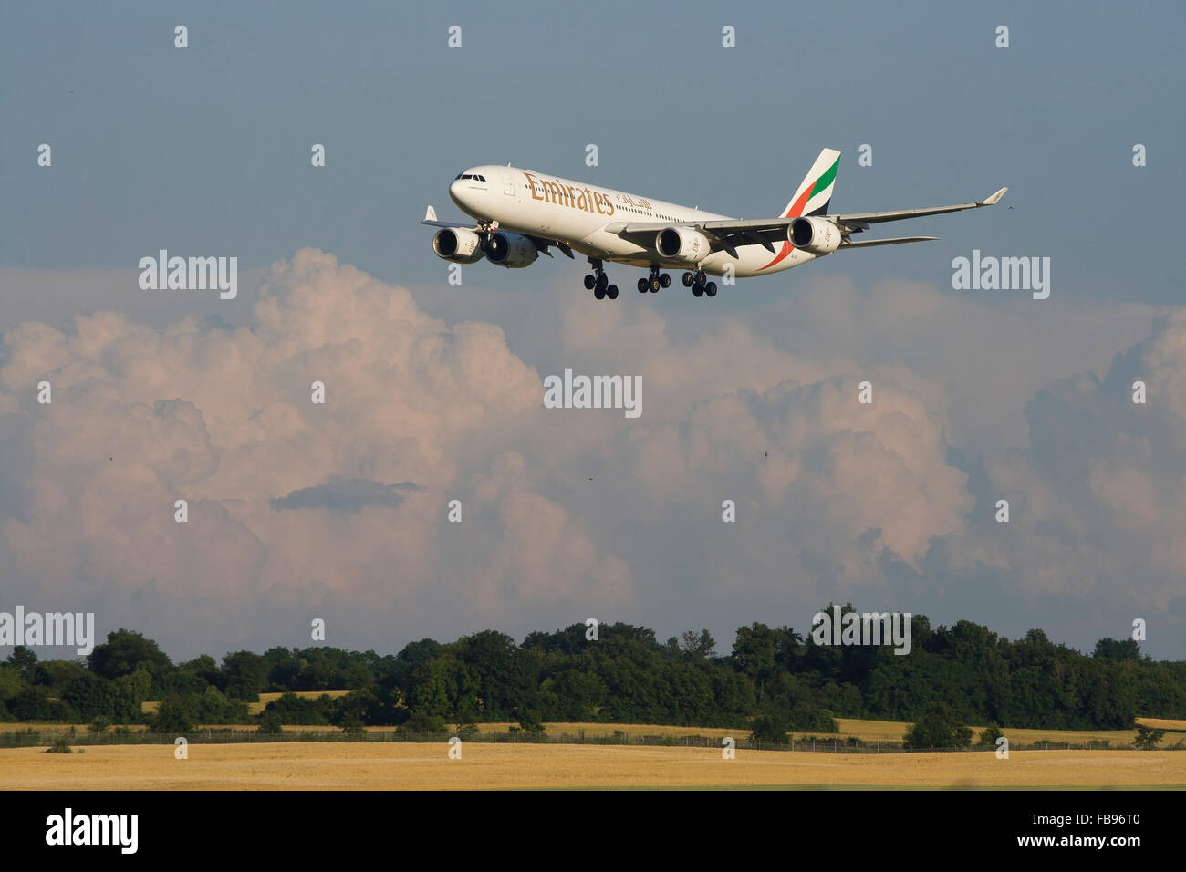 Emirates Airbus A340-500 landing at Lyon St Exupery airport Stock Photo ...