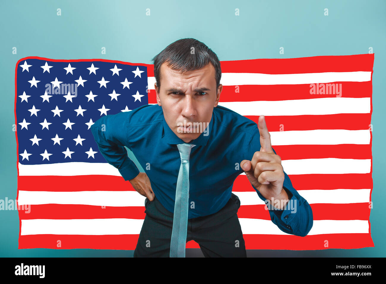 a male frowned angry businessman raised his index finger America Stock ...