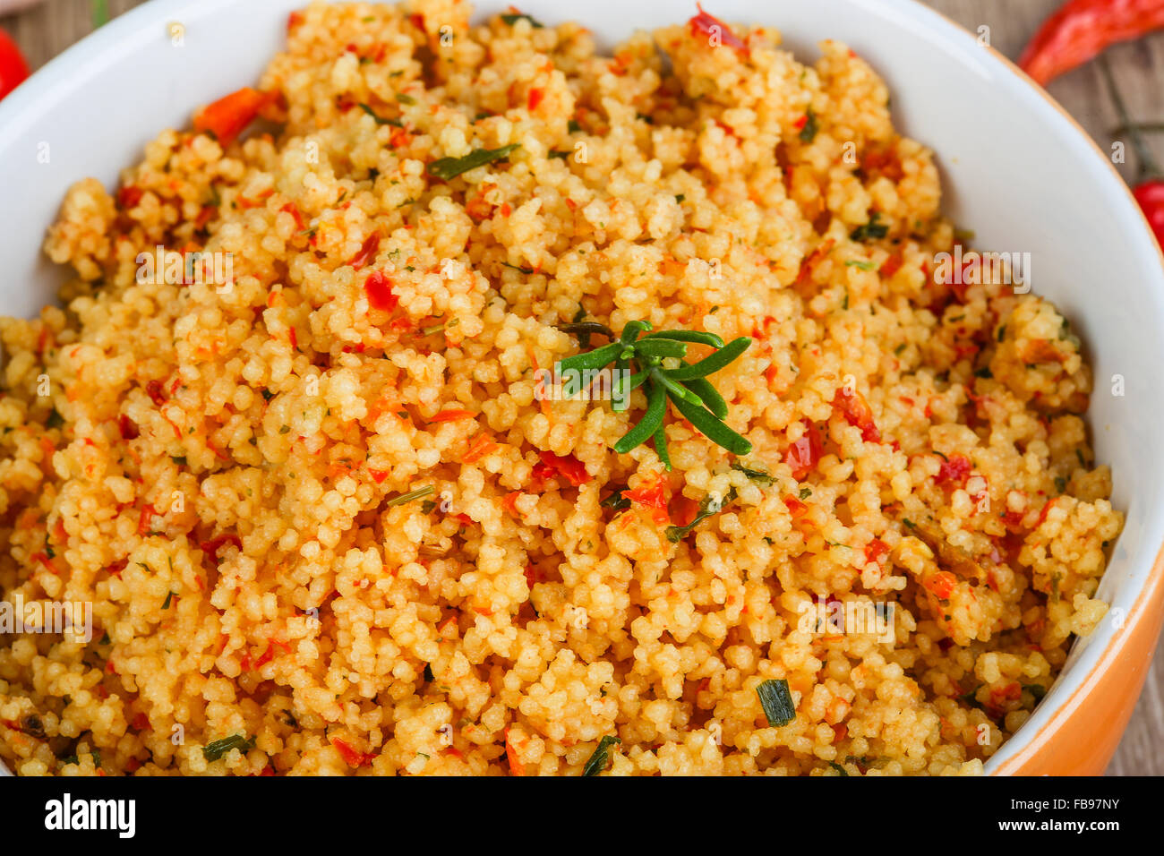 Arabic traditional cuisine - Couscous with tomato and green onion Stock ...