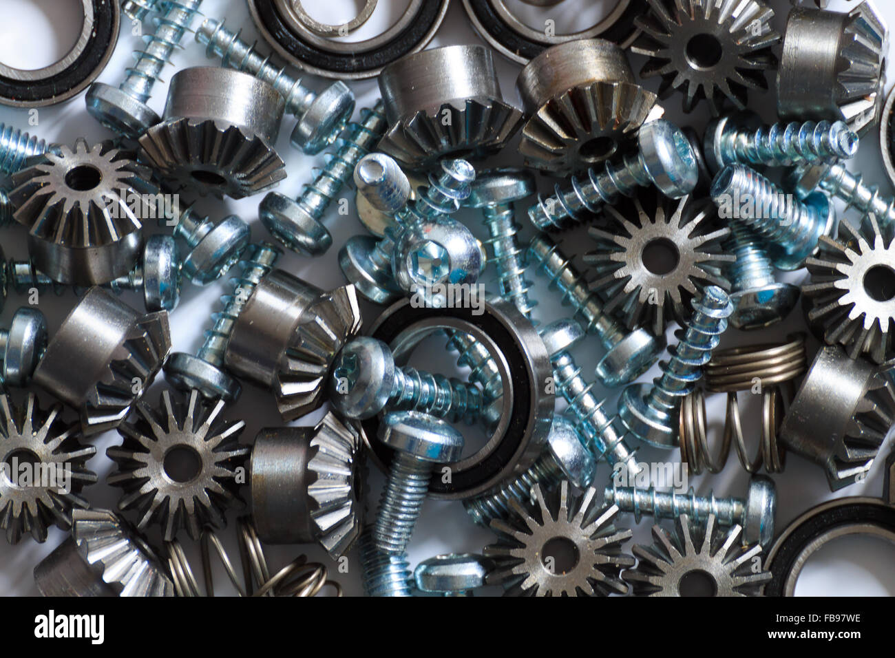 A background with different mechanical components, gears, springs ...