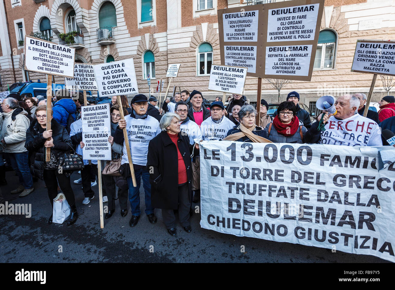 Rome, Italy. 12th Jan, 2016. Protesters shout slogans and hold banners ...