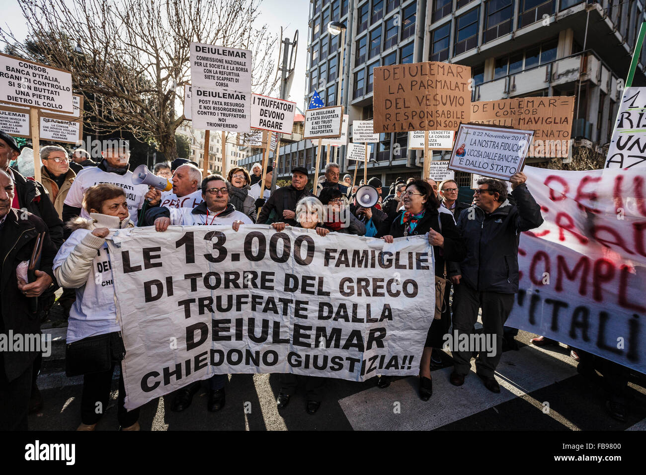 Rome, Italy. 12th Jan, 2016. Protesters shout slogans and hold banners ...