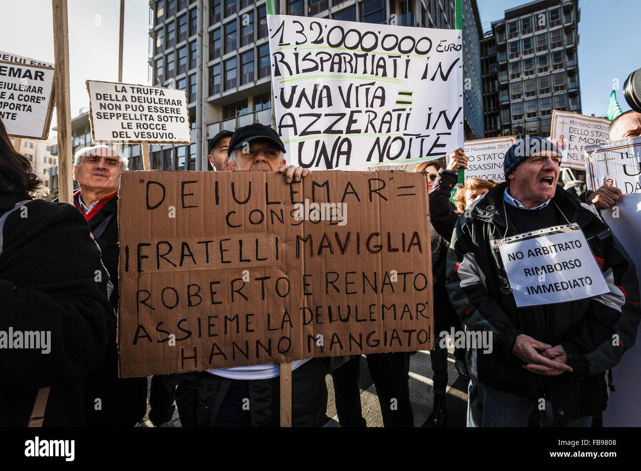 Rome, Italy. 12th Jan, 2016. Protesters shout slogans and hold banners ...