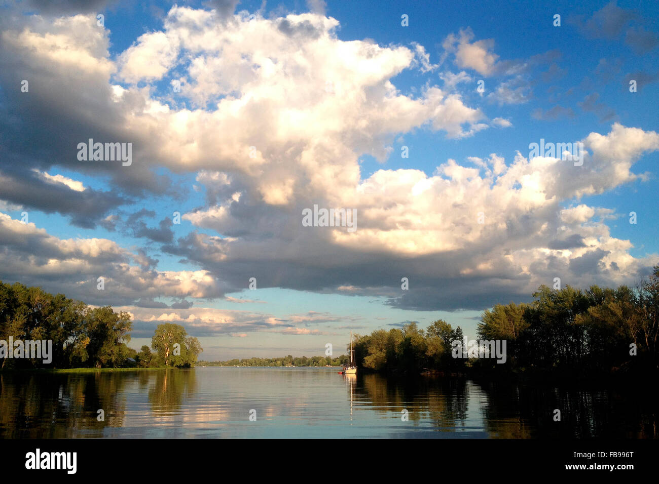 A boat anchored off Ile Dubé in the Outaouais River Stock Photo - Alamy