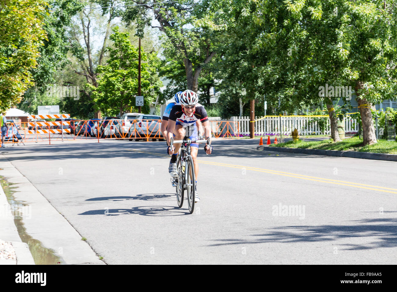 Professional bicycle race through residential streets of Denver ...