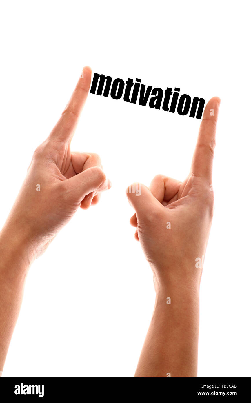 Color vertical shot of a of a hand squeezing the word "motivation Stock ...