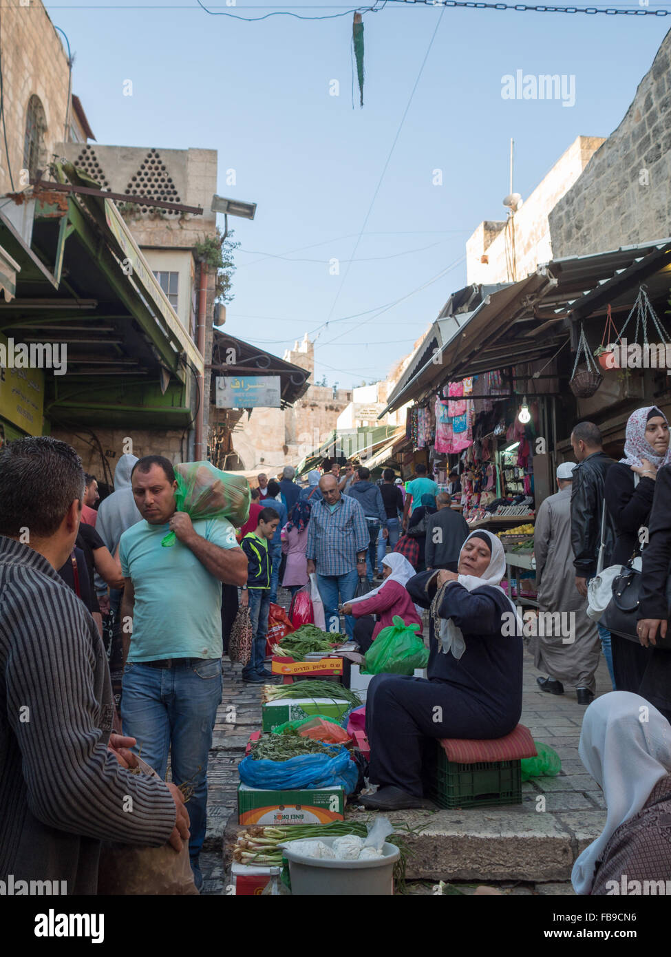 People at the street market of the Muslim Quarter Stock Photo - Alamy