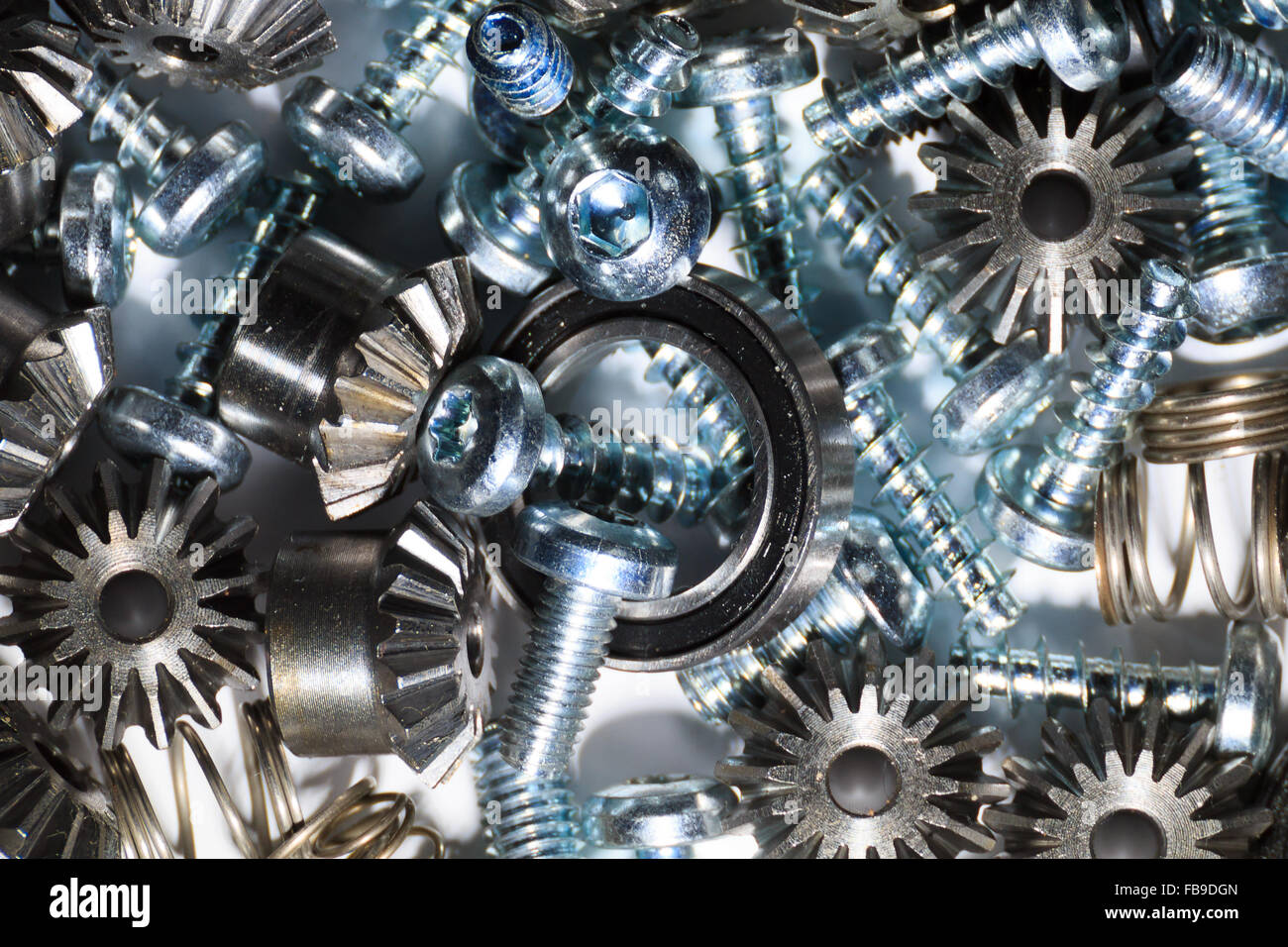 A background with different mechanical components, gears, springs ...