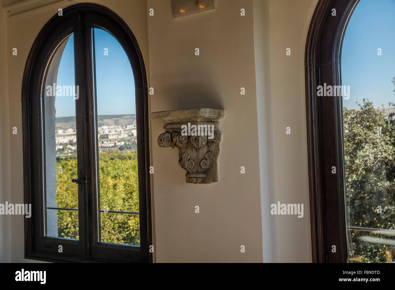 Close up of architecture on the wall of a building in Spain with arch ...