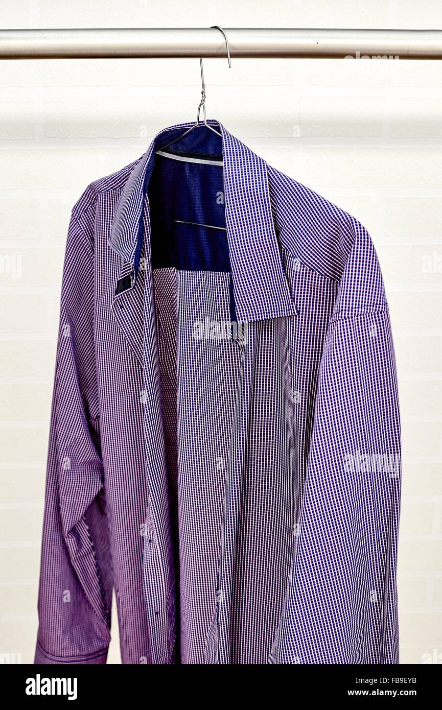 A studio image of hanging clothes Stock Photo - Alamy