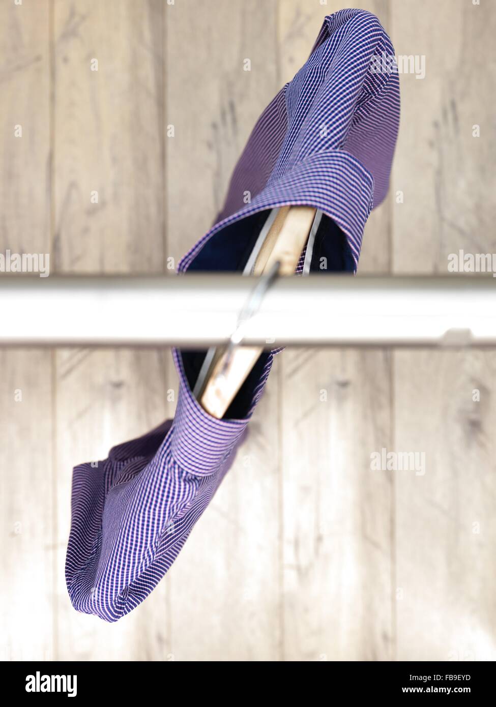 A studio image of hanging clothes Stock Photo - Alamy