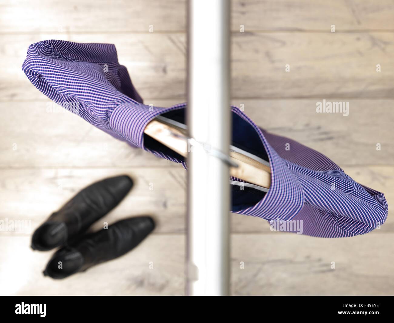 A studio image of hanging clothes Stock Photo - Alamy