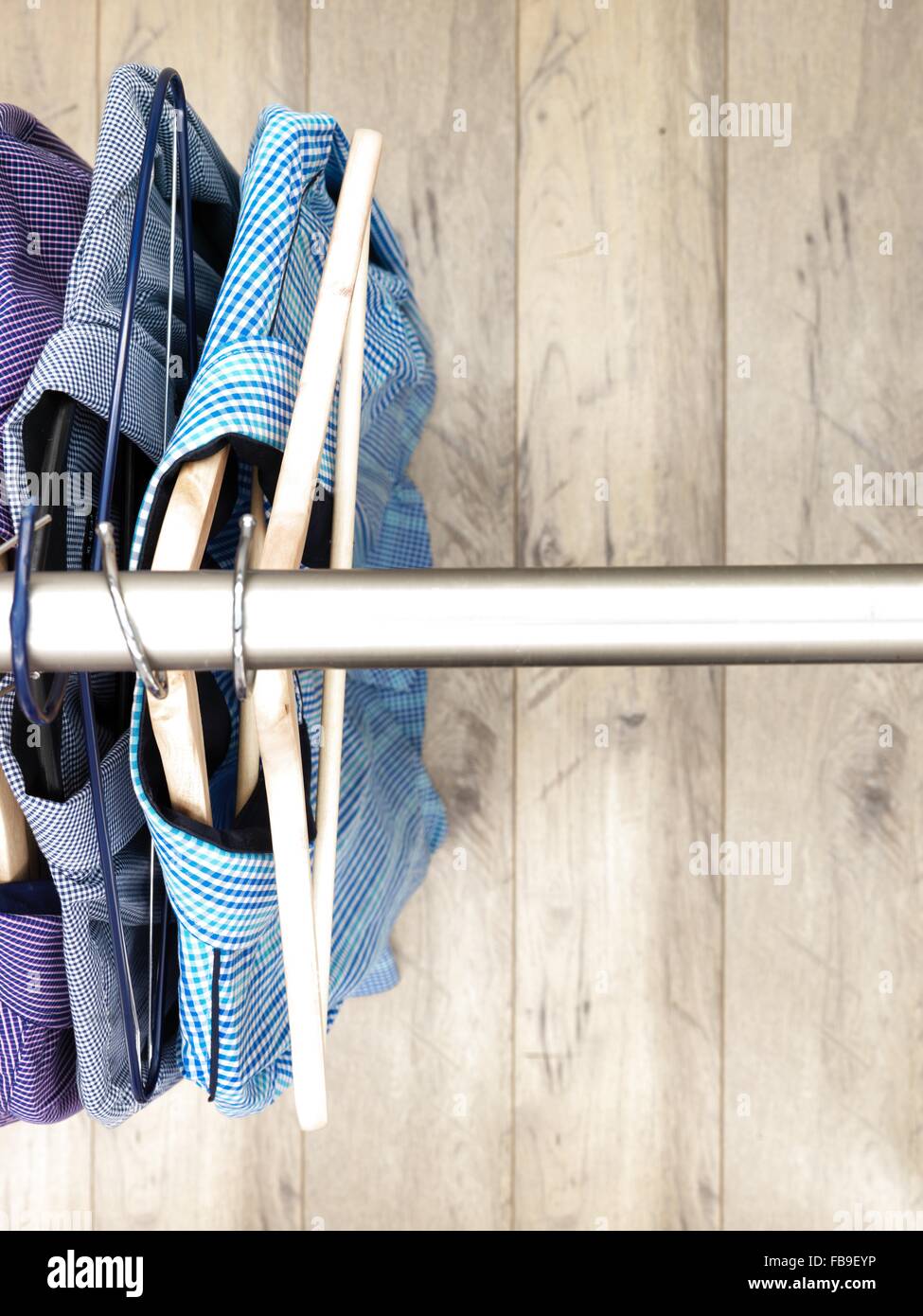 A studio image of hanging clothes Stock Photo - Alamy