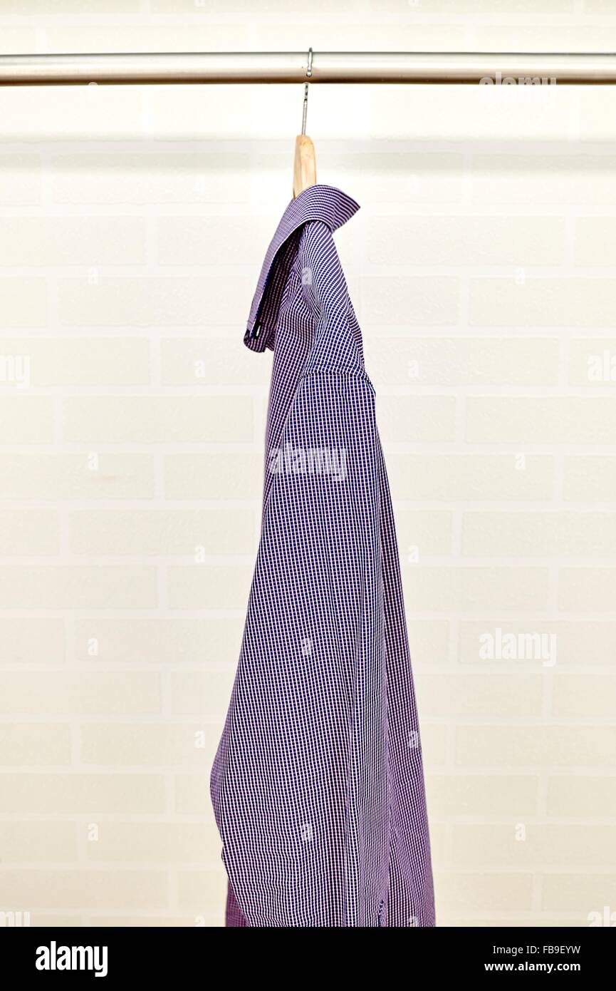 A studio image of hanging clothes Stock Photo - Alamy