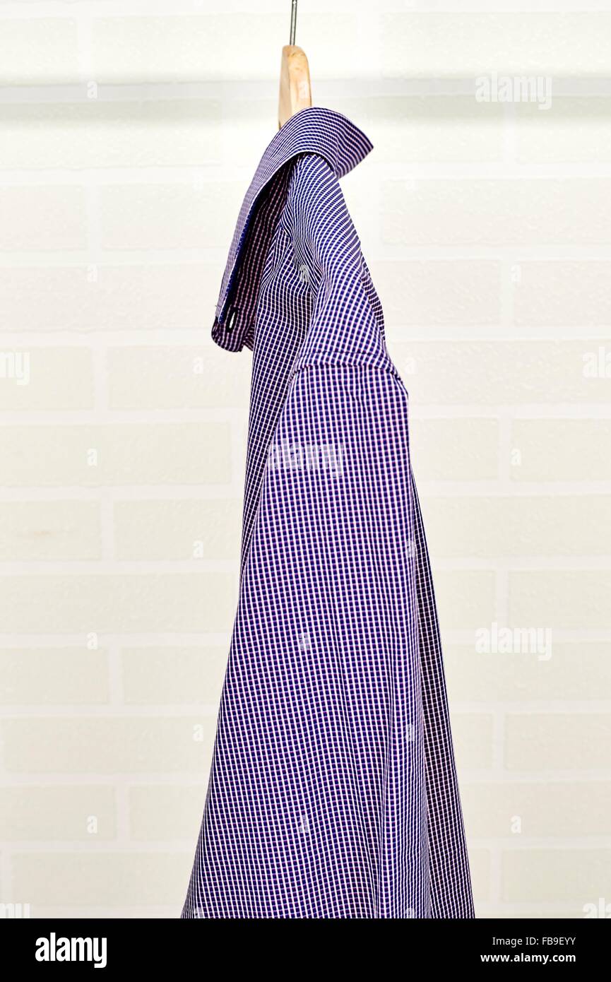 A studio image of hanging clothes Stock Photo - Alamy