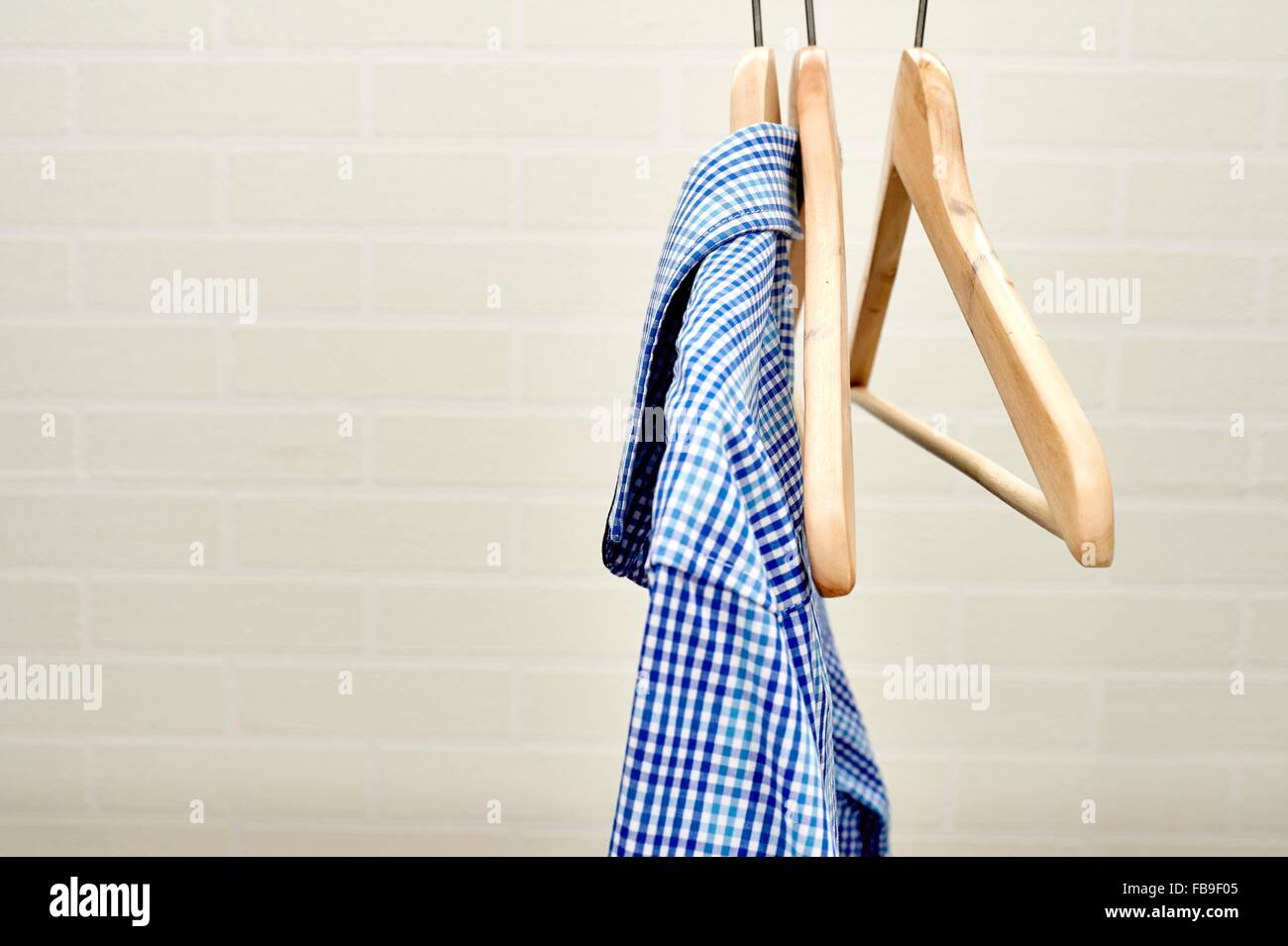 A studio image of hanging clothes Stock Photo - Alamy