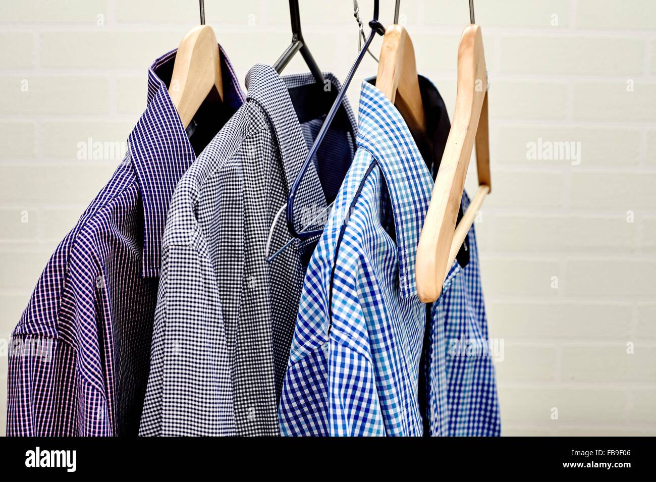 A studio image of hanging clothes Stock Photo - Alamy