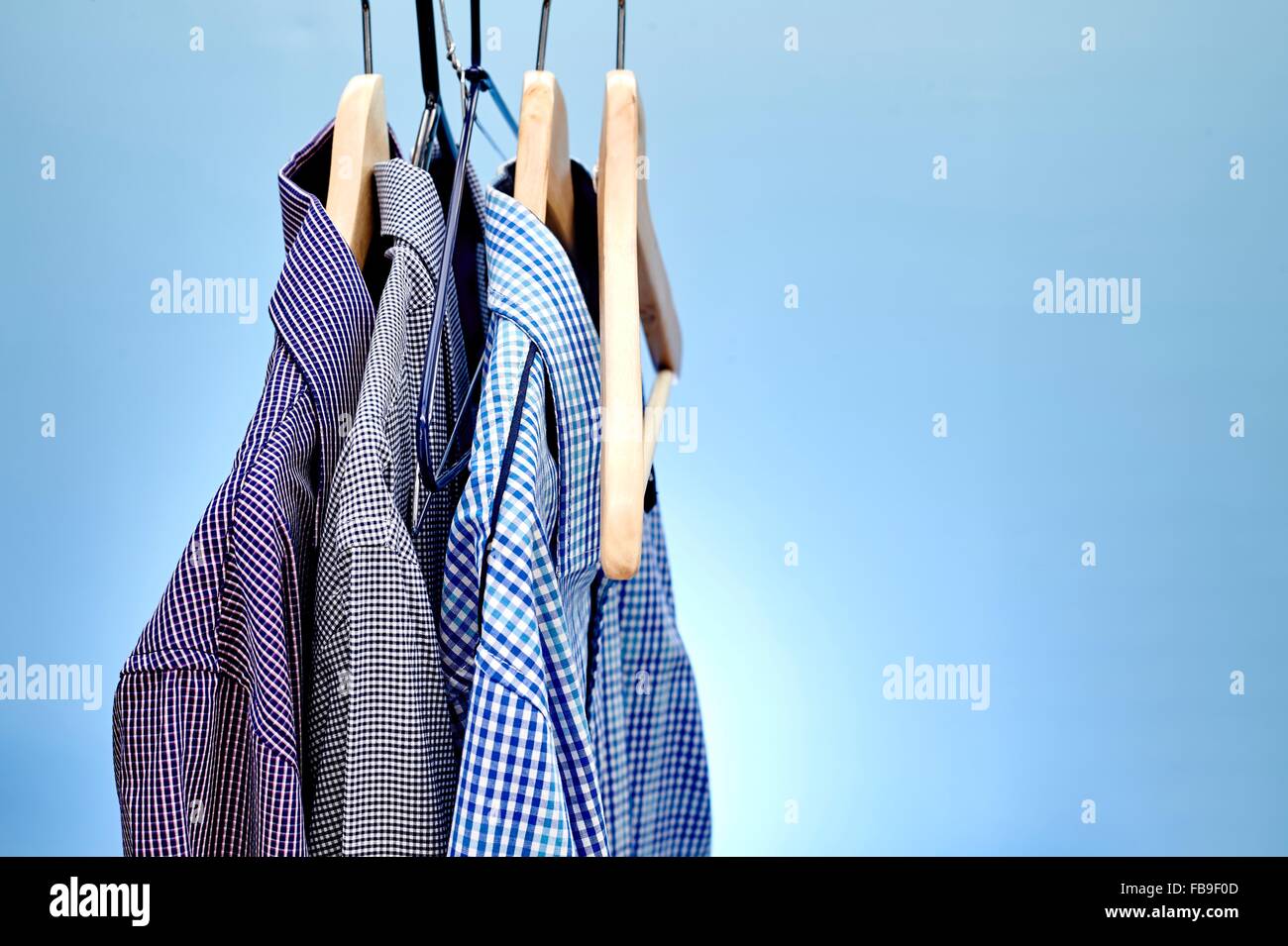 A studio image of hanging clothes Stock Photo - Alamy