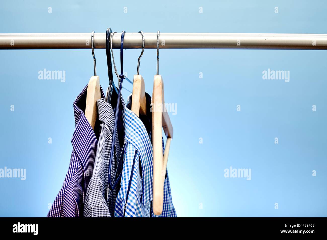 A studio image of hanging clothes Stock Photo - Alamy