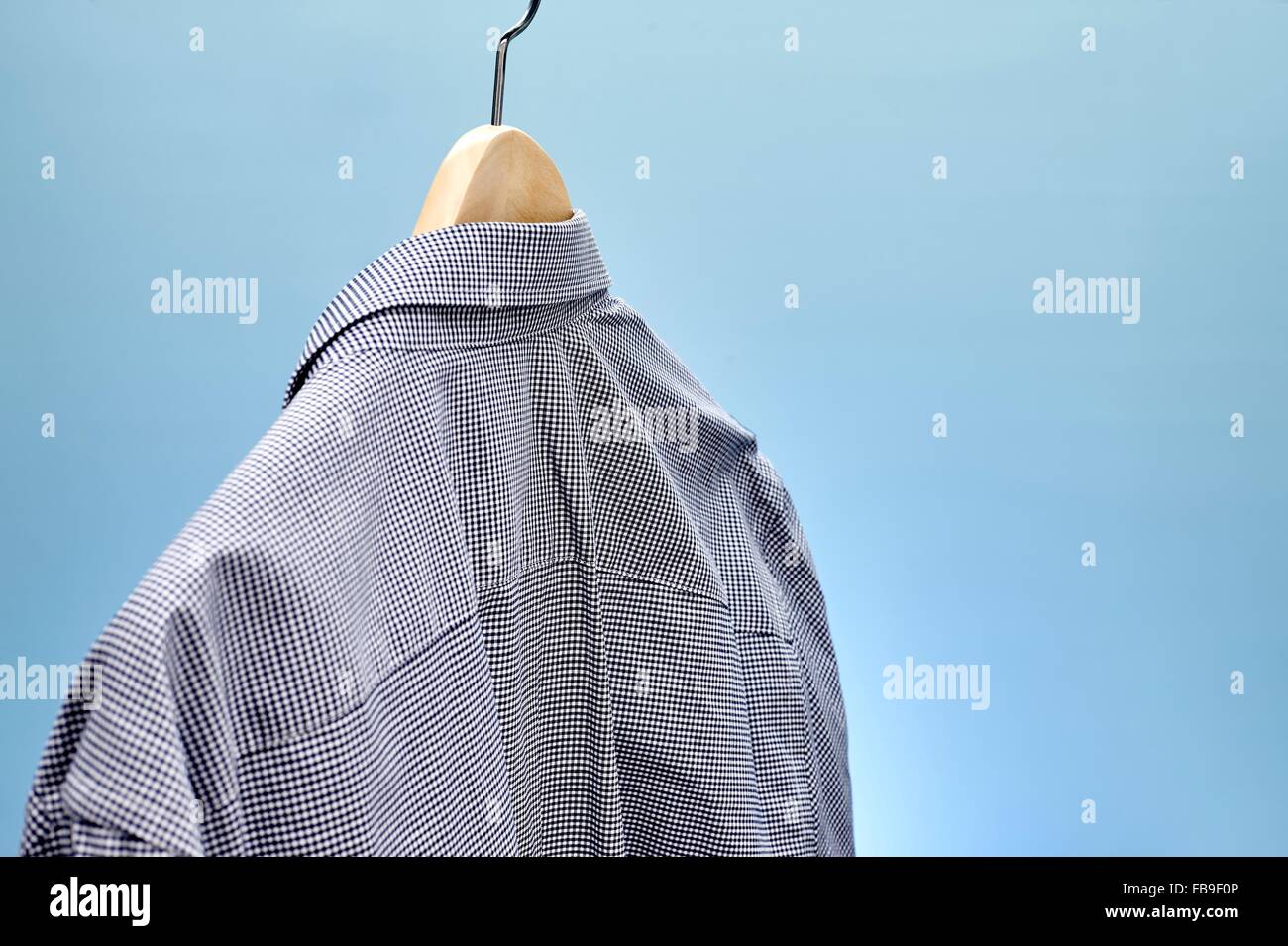 A studio image of hanging clothes Stock Photo - Alamy