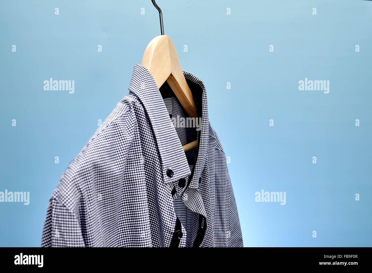 A studio image of hanging clothes Stock Photo - Alamy