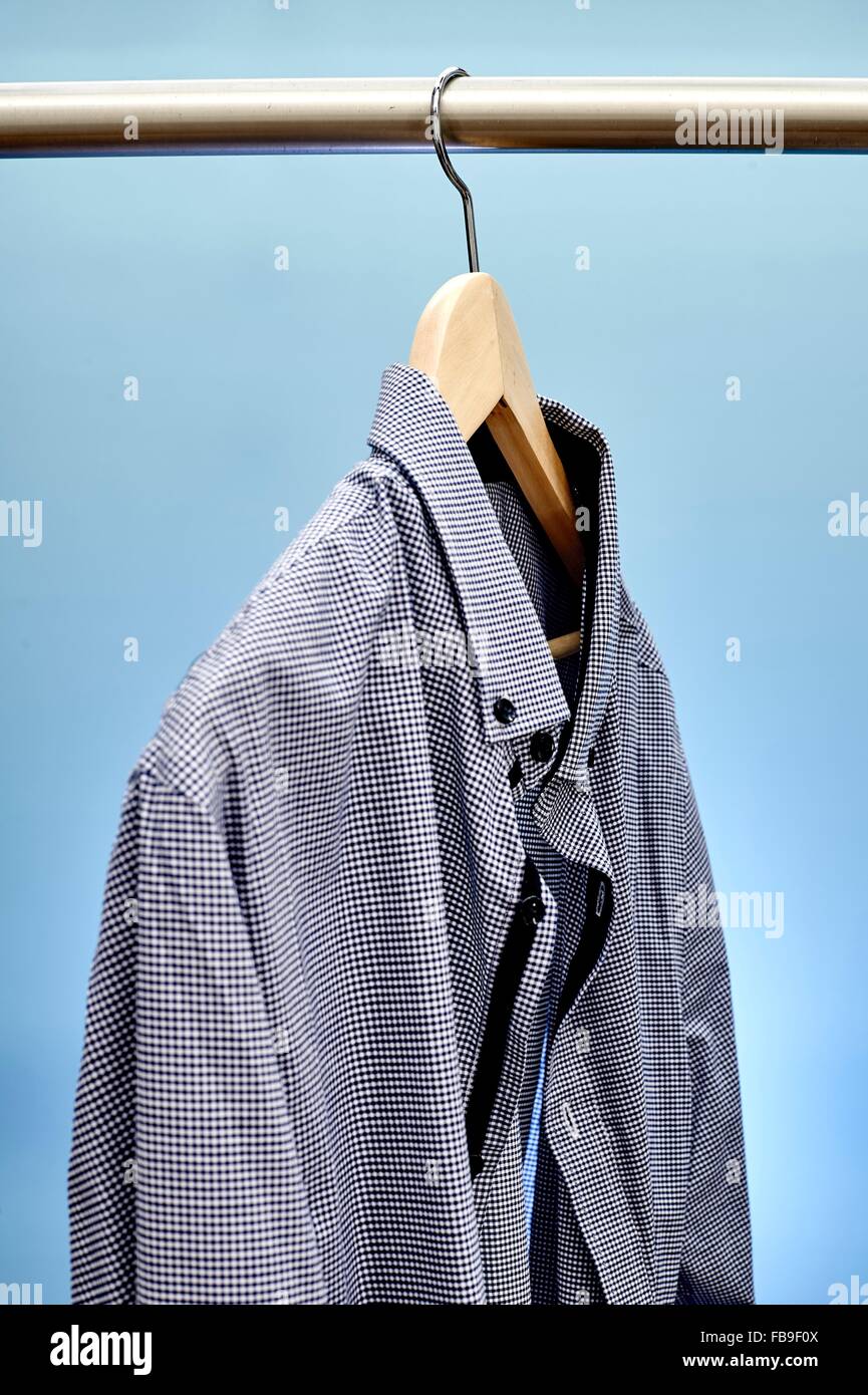 A studio image of hanging clothes Stock Photo - Alamy