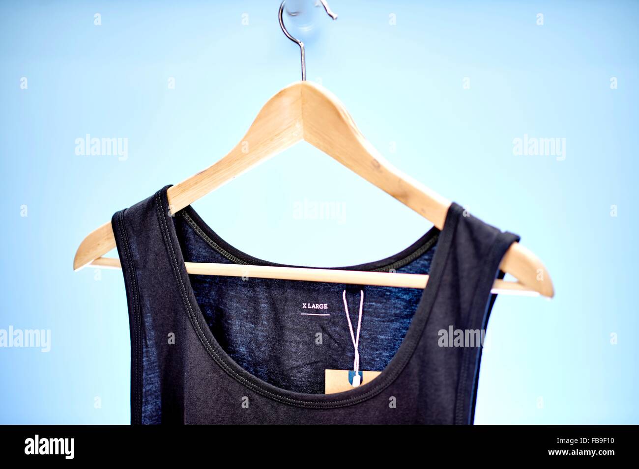 A studio image of hanging clothes Stock Photo - Alamy