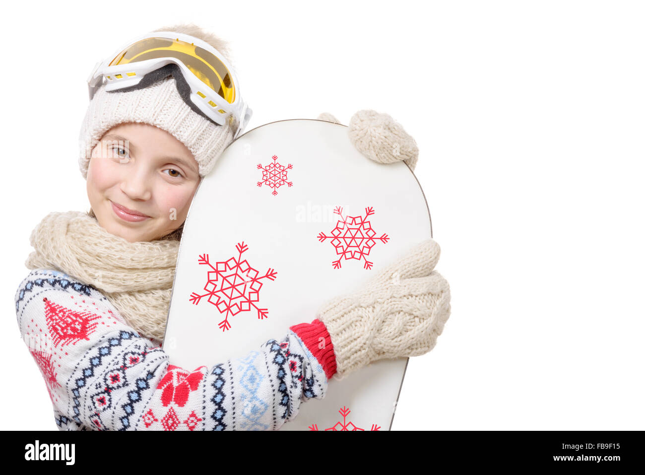 a portrait of a happy young girl snowboarding Stock Photo - Alamy
