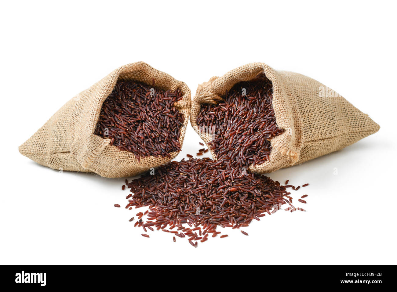 red rice in sack bag Stock Photo - Alamy