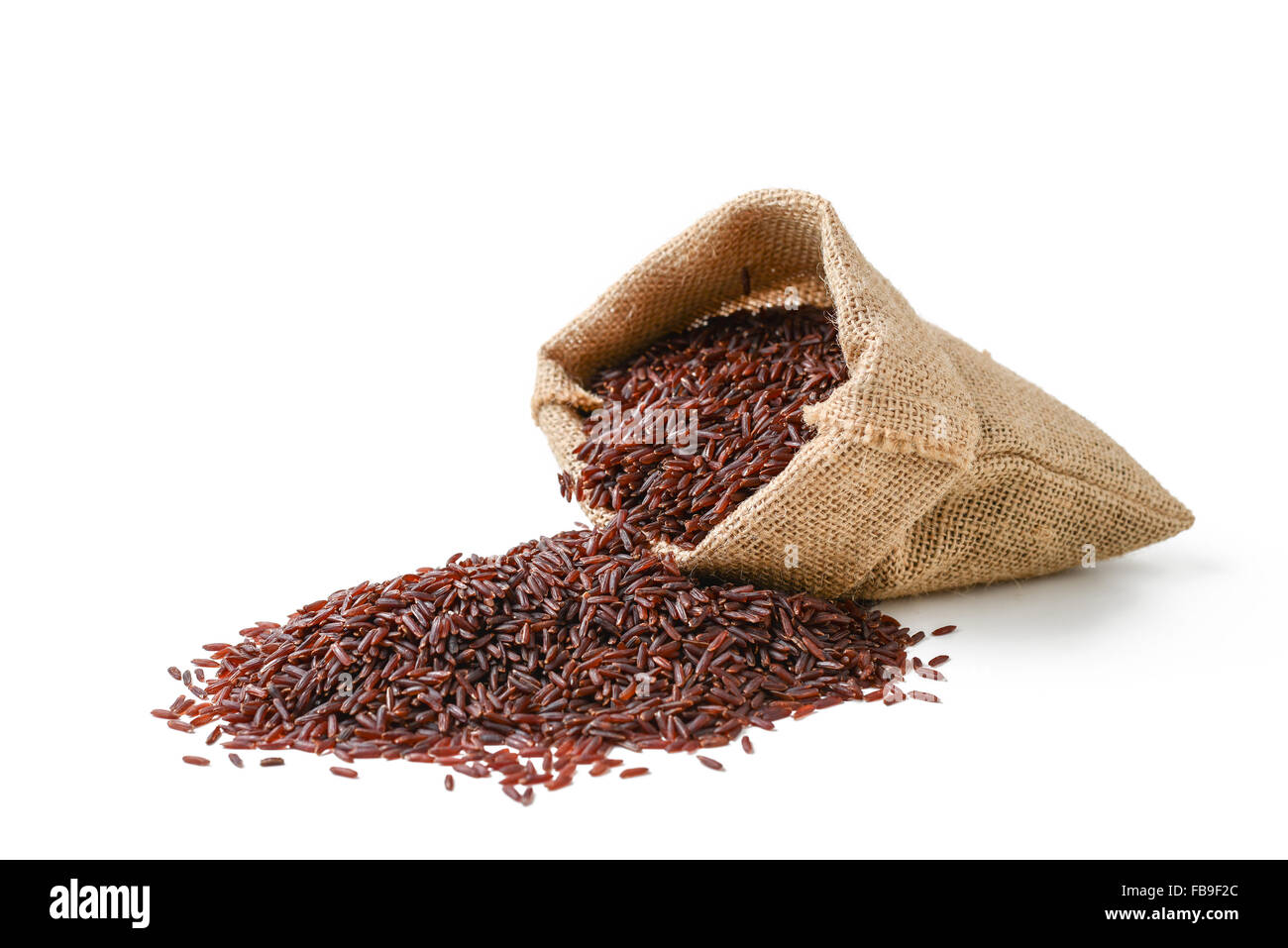 red rice in sack bag Stock Photo - Alamy