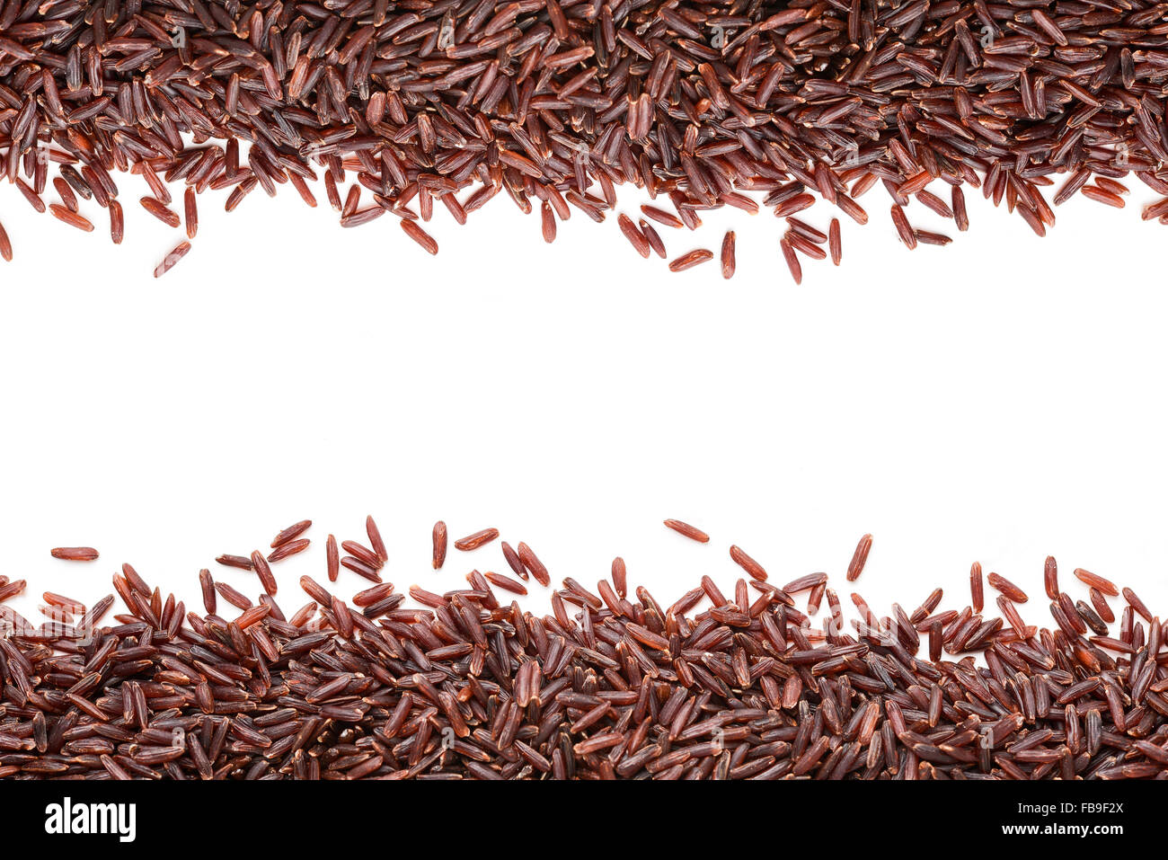 red rice heap background Stock Photo - Alamy