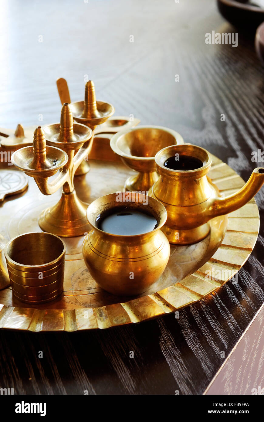 Golden objects at Hindu temple Stock Photo - Alamy